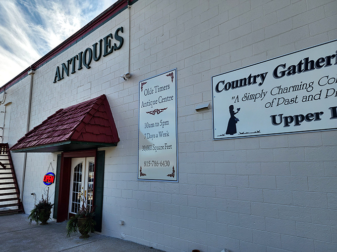 The classic storefront of Olde Timers beckons with hometown warmth and vintage treasures beyond those doors.