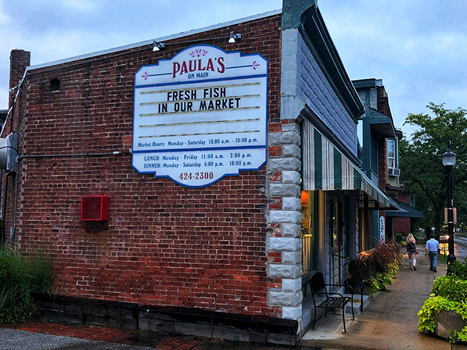 Sometimes the most unassuming exteriors hide the deepest seafood traditions and the warmest neighborhood welcomes inside.