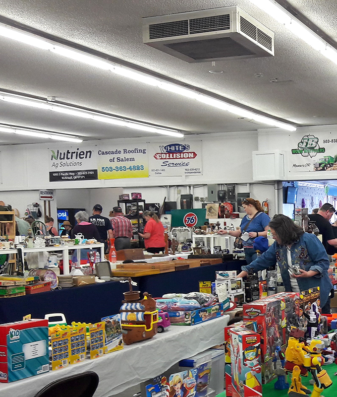 Polk Flea Market's interior is like a museum where you can touch&mdash;and buy&mdash;the exhibits. Those overhead banners add a carnival atmosphere to this bargain bonanza.