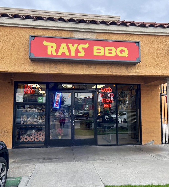 Those glowing "Wood Fired Texas BBQ" signs at Ray's aren't just decoration&mdash;they're a solemn promise that's kept with every smoky bite.