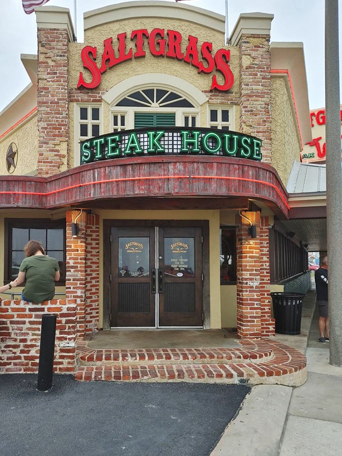 The curved brick entrance beckons hungry visitors inside. Saltgrass combines coastal charm with serious steak credentials.