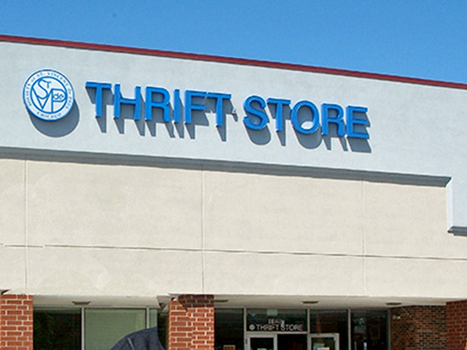 The clean lines and straightforward branding of St. Vincent's store mask a wonderland of upscale secondhand finds.