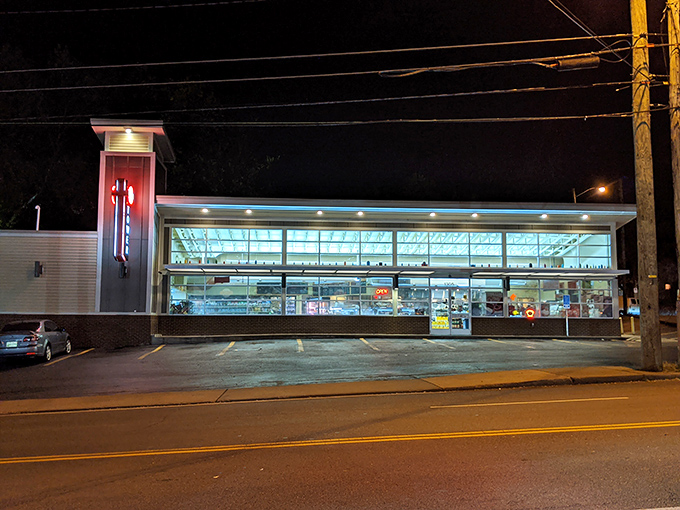 Those floor-to-ceiling windows let natural light showcase the sandwich artistry happening inside daily.