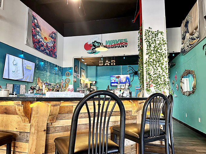 Inside Waves, the beach theme continues with turquoise walls and a welcoming bar. Vacation vibes with every bite!