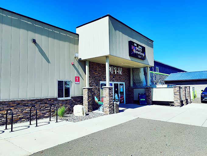 Action City bowling alley stands ready for friendly competition, where retirement dreams of finally perfecting that elusive spare can become glorious reality.