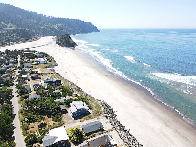 From above, Neskowin reveals its perfect geometry&mdash;a village nestled precisely where forest, river, and ocean converge in coastal harmony.