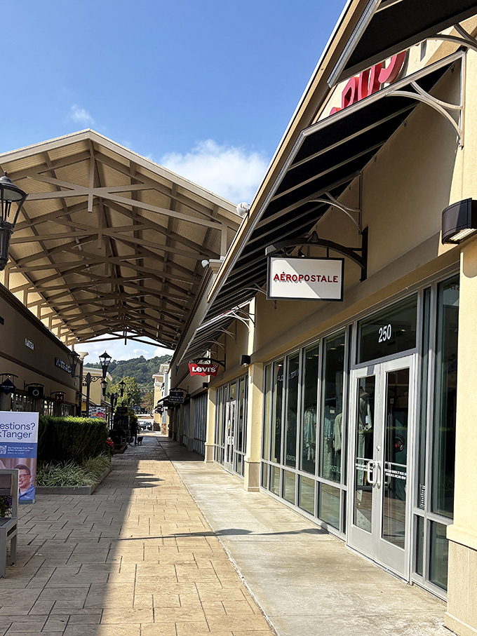 Aéropostale's clean lines and covered walkway showcase Asheville Outlets' thoughtful design – shopping comfort at its finest.