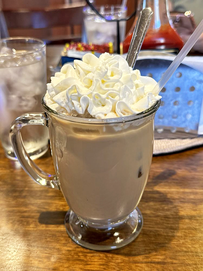 This isn't just coffee, it's an Amaretto Latte wearing a cloud of whipped cream&mdash;dessert masquerading as a beverage, and we're not complaining.