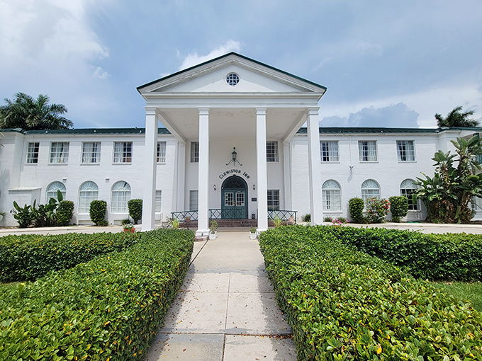 The Clewiston Inn's stately white columns welcome visitors like a Southern belle greeting guests at a garden party &ndash; gracious, elegant, and timeless. 