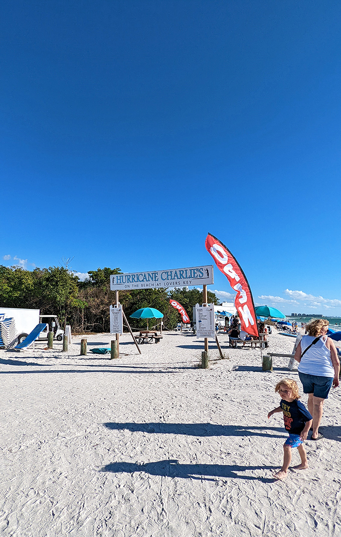 Hurricane Charlie's beach stand &ndash; proof that even after storms, Florida finds a way to bounce back with umbrellas, snacks, and that unbeatable Gulf view.