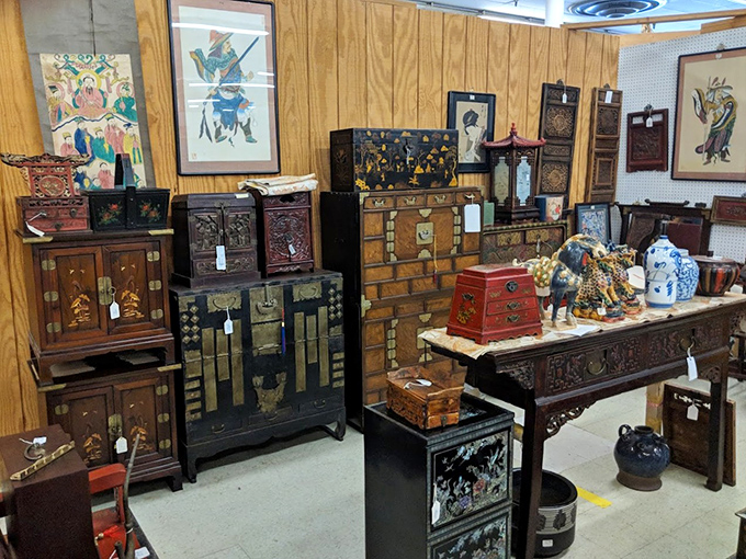 These ornate Asian cabinets whisper stories of craftsmanship from eras when furniture meant forever.
