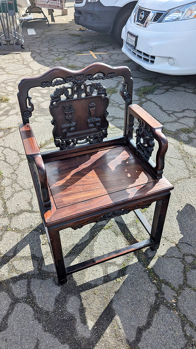 This ornately carved Chinese chair has witnessed a century of conversations. Imagine the dinner parties it could host in your home.