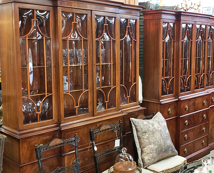 Mahogany masterpieces with more character than most Netflix series. These cabinets have probably held everything from wedding china to secret love letters. 