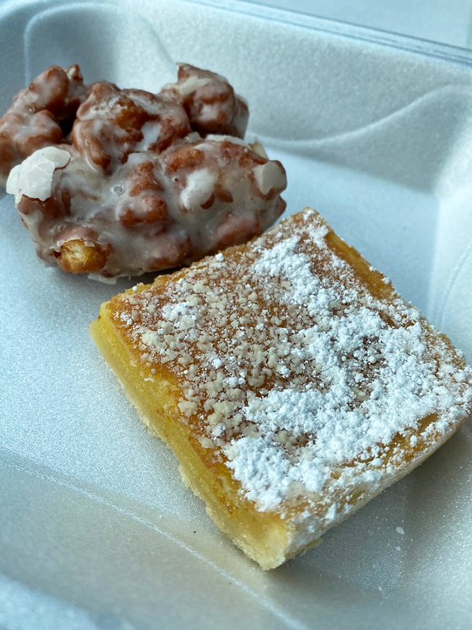 Lemon bars and apple fritters living in harmony, proving that world peace might start with baked goods.