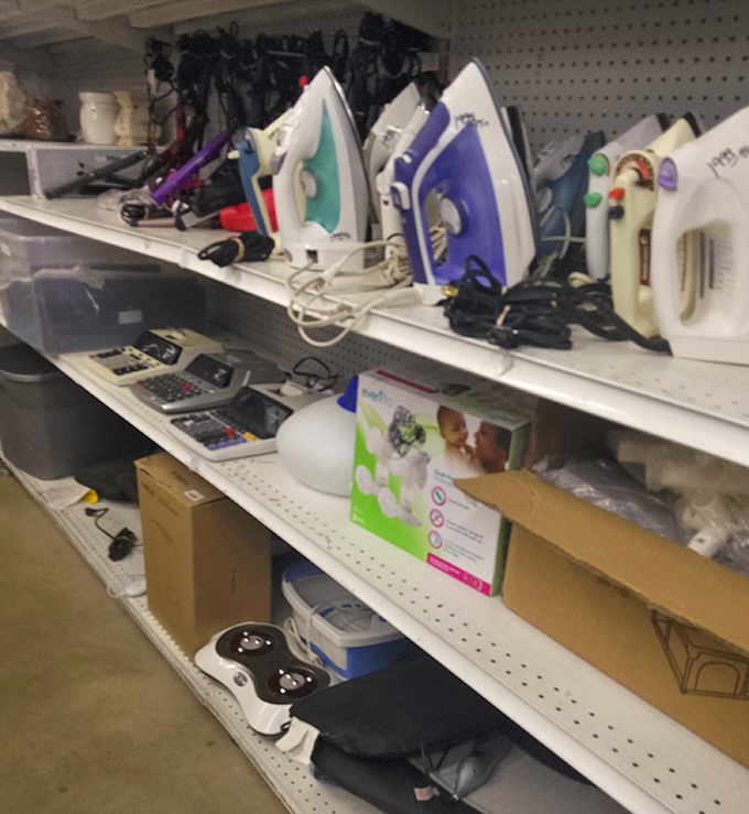 The small appliance section: where irons, calculators, and gadgets enjoy their golden years, hoping for one more chance to prove their worth.
