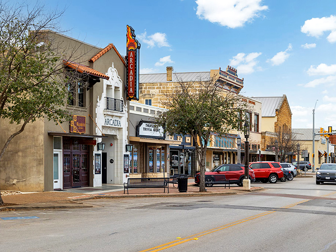 The historic Arcadia Theater's neon sign lights up downtown, offering entertainment options without big-city crowds or prices.