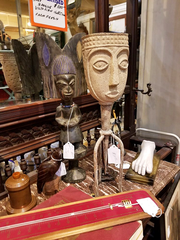 Tribal art and sculptural oddities that would make Indiana Jones do a double-take. That marble foot? Perfect for your coffee table conversation starter.