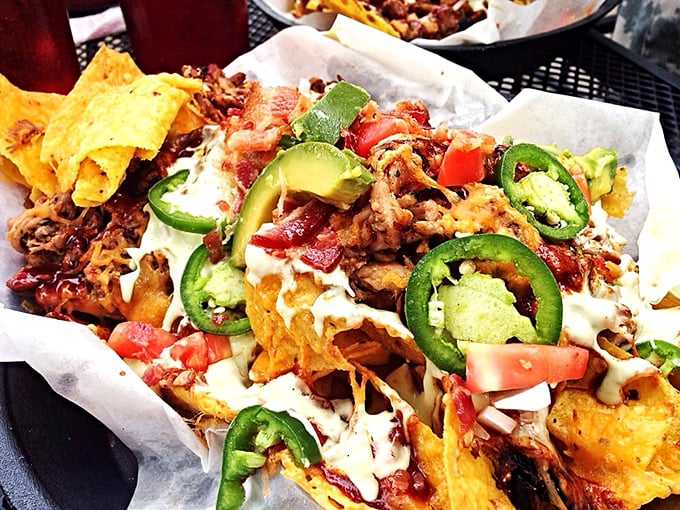 BBQ nachos that break all the rules. Crispy chips buried under an avalanche of meat, jalape&ntilde;os, and creamy toppings &ndash; fork required, restraint impossible.