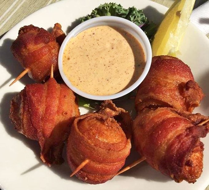 "Bacon-wrapped scallops &ndash; because sometimes the ocean's treasures need a little help from a pig to reach maximum deliciousness."