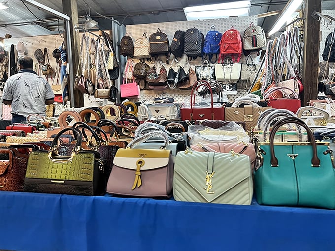 Designer bag heaven or clever replicas? Either way, this colorful display of purses promises fashion statements at flea market prices.