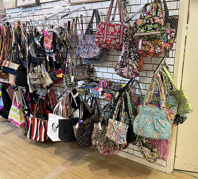 Bag lady heaven! This wall of purses and totes represents thousands of dollars in retail value&mdash;available for the price of a fancy coffee shop visit.