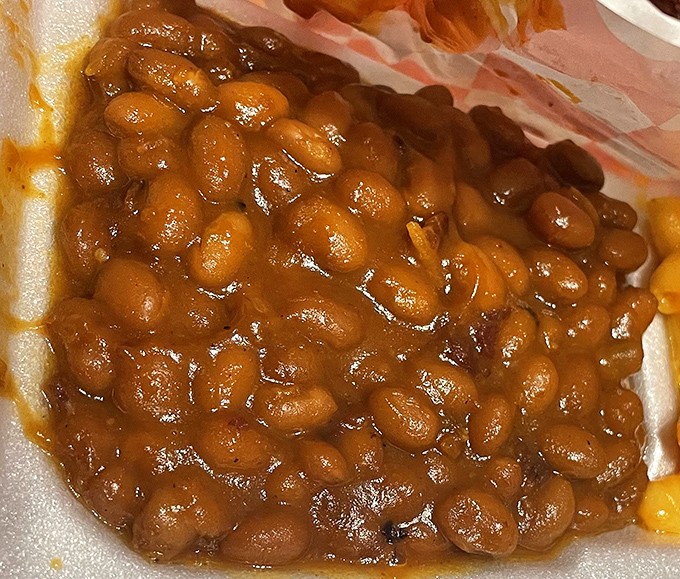 These aren't your sad, straight-from-the-can baked beans. They've clearly been hanging out with pork drippings and getting into the good kind of trouble.