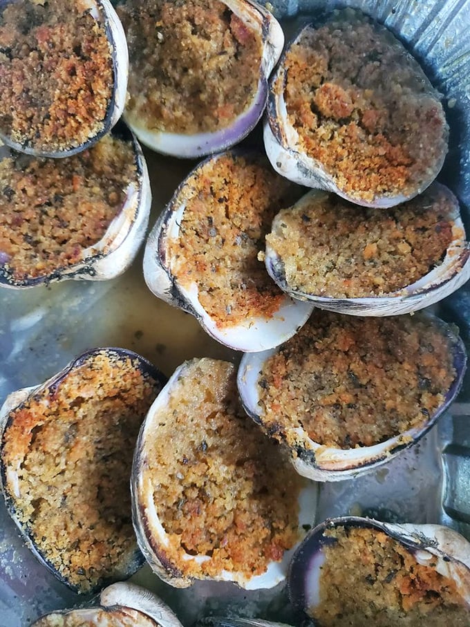 Baked clams that taste like the ocean took a delicious Italian vacation. Breadcrumbs, herbs, and clam perfection.