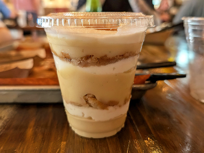 Banana pudding layered like a sweet geology experiment&mdash;vanilla wafers creating delicious sedimentary layers between creamy goodness.