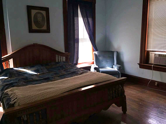 A bedroom that whispers, "Sleep tight, don't let the... well, anything bite." That chair in the corner? Definitely not watching you all night.