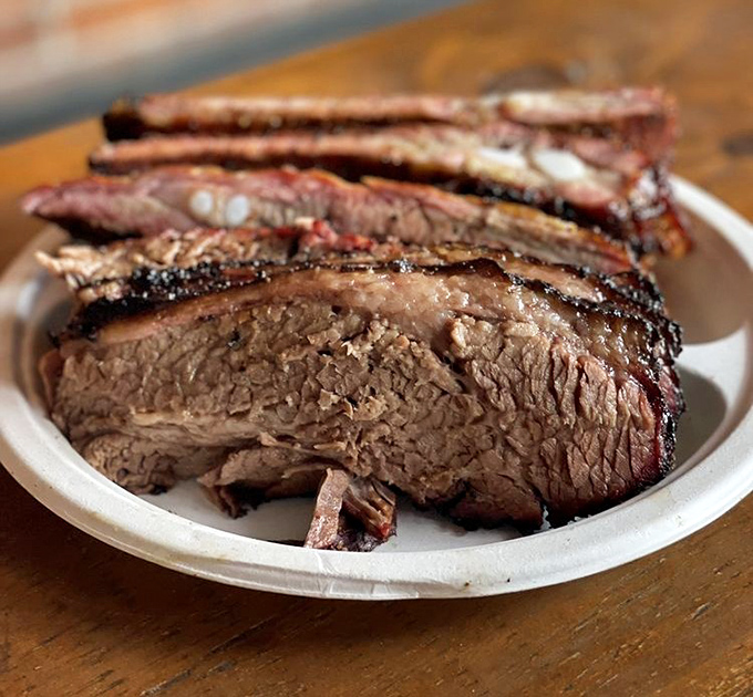 Brisket with a bark so perfect it should be in a museum. The smoke ring is the barbecue equivalent of a Rolex.