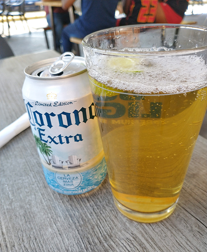 Nothing complements pizza like a cold one. This Corona isn't just a beer; it's the perfect supporting actor in your meal's blockbuster performance.