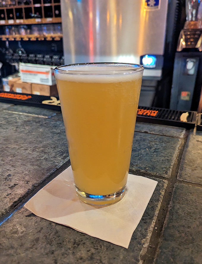 Golden beer catches the light like liquid sunshine, the perfect companion for any Italian feast.