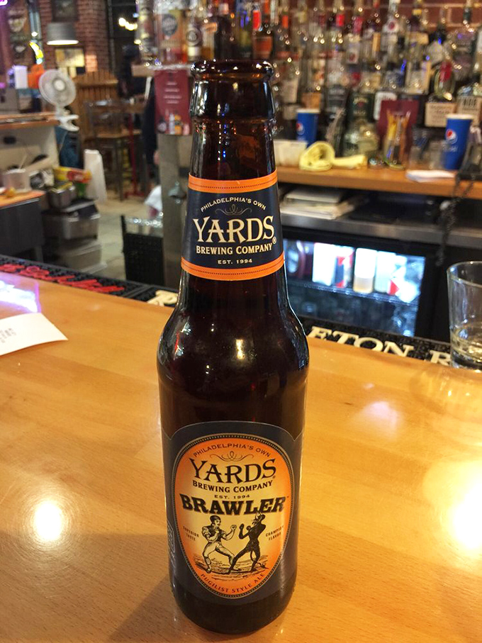Yards Brawler beer standing tall, ready to wrestle with all that smoky goodness on your palate.