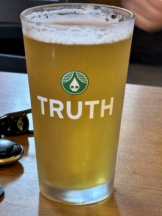 Truth in advertising: this golden craft beer promises honest refreshment after a long day of adulting. The perfect amber companion to those legendary tots.