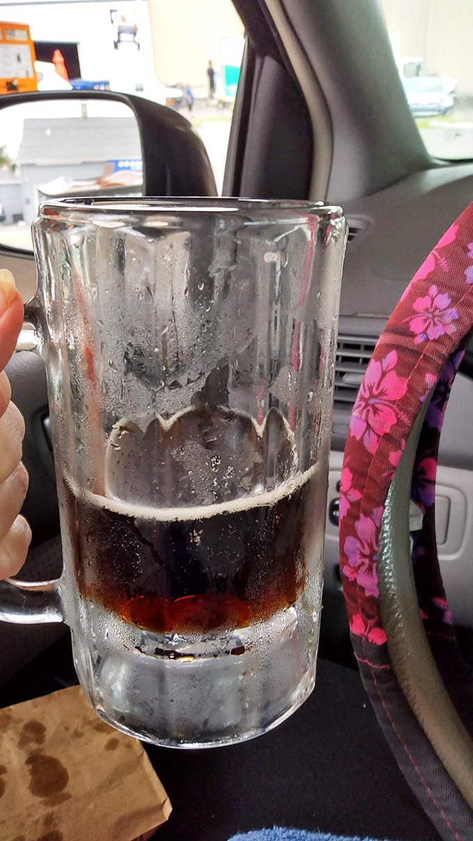 Car cup holders were invented for moments like this. Half-empty mugs of Jolly's root beer are monuments to restraint few can maintain.