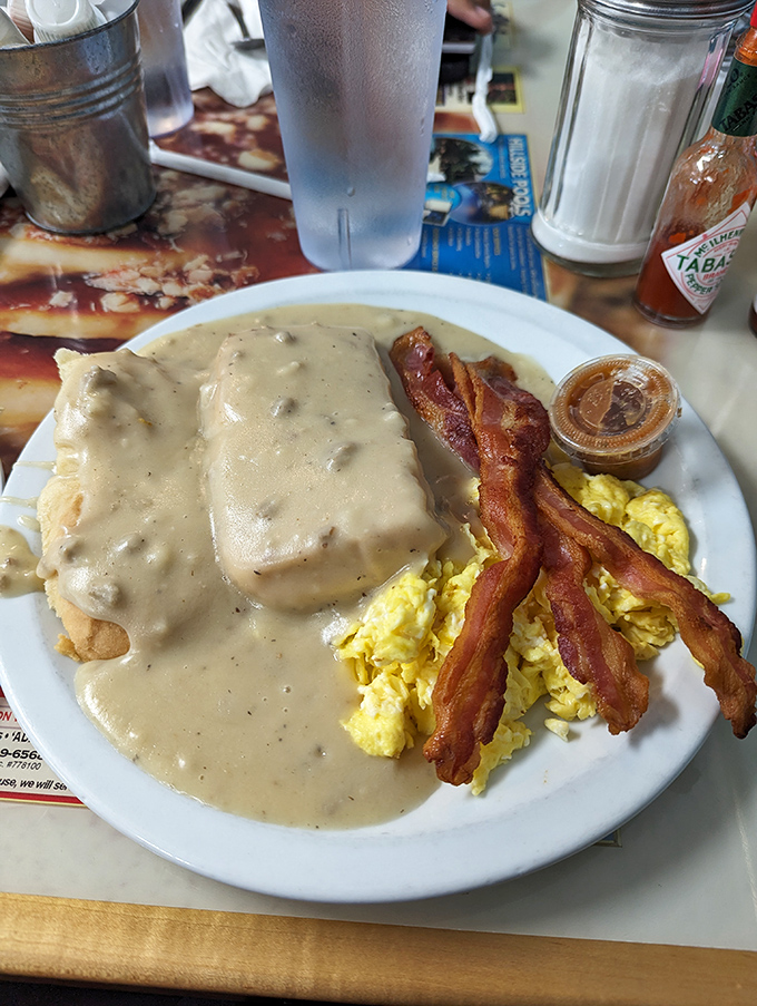 That gravy blanket over fresh biscuits could make even Monday mornings worth celebrating.