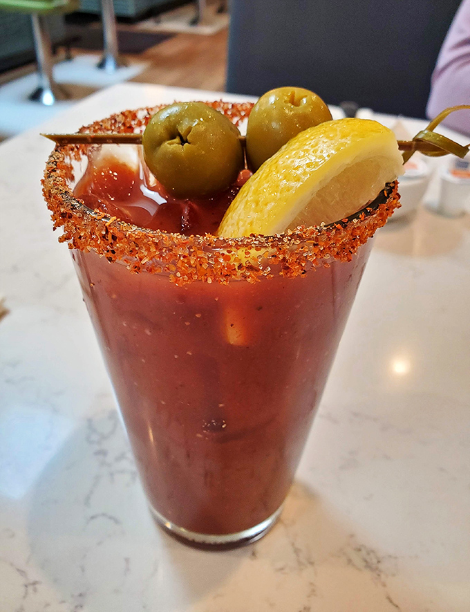 A Bloody Mary that's practically a meal unto itself. That spicy rim isn't playing games &ndash; it means business, delicious business.