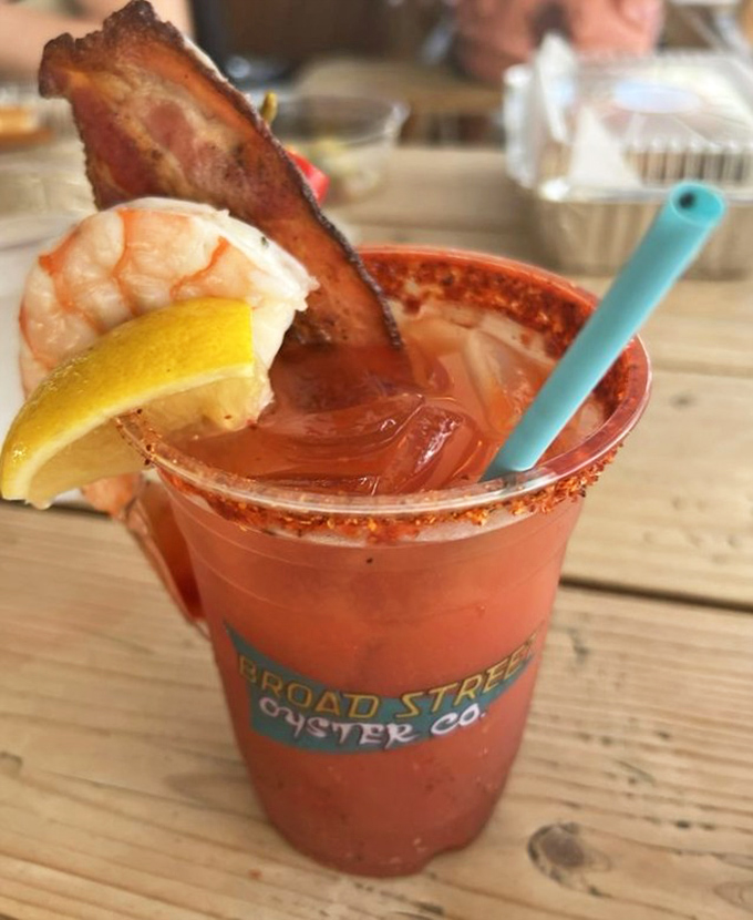 Their Bloody Mary comes armed for battle with a prawn perched on the rim and a bacon spear standing guard&mdash;breakfast, cocktail, and appetizer in one glorious glass.