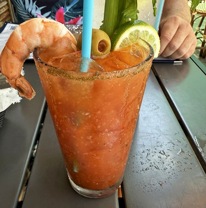 Their Bloody Mary isn't just a drink, it's an edible sculpture with a jumbo shrimp perched on the rim like it's enjoying the view.