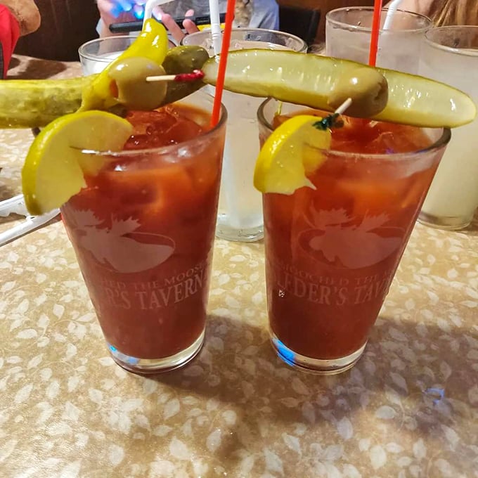 These Bloody Marys aren't just drinks &ndash; they're meal substitutes with impressive garnish architecture. That pickle spear could double as a small defensive weapon. 