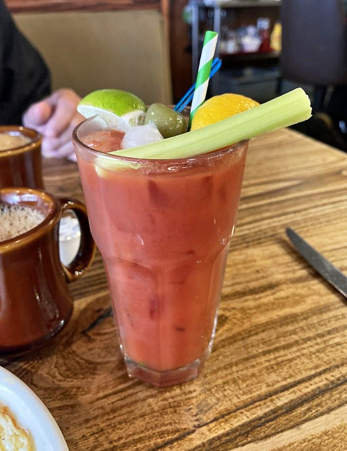 A Bloody Mary garnished with enough vegetables to count as a salad, because balance is everything at brunch time.