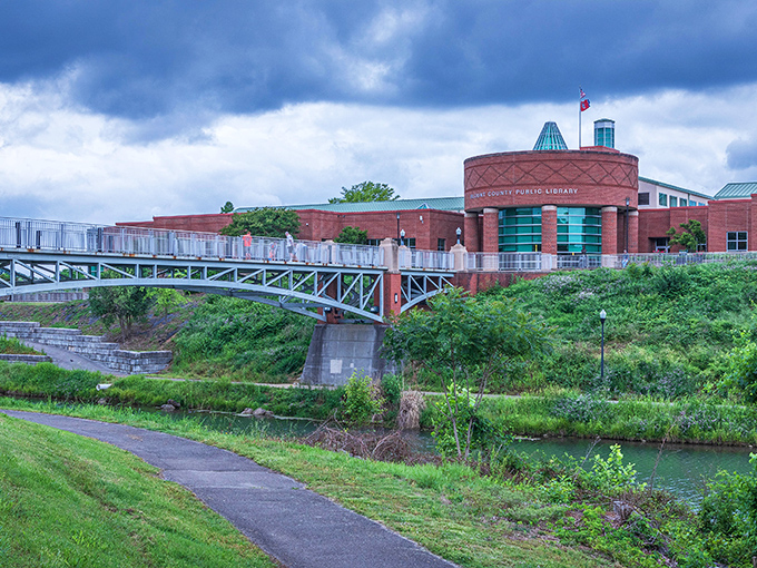 The Blount County Public Library isn't just about books&mdash;it's a modern community hub connected to nature by an architectural handshake across the water.