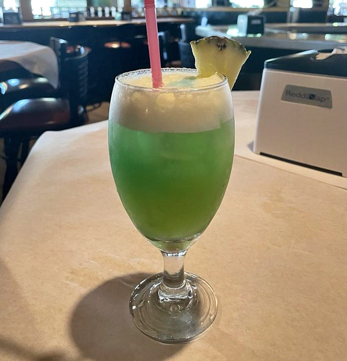 The Blue Hawaiian cocktail isn't just a drink; it's a liquid postcard from paradise that somehow found its way to Orlando.
