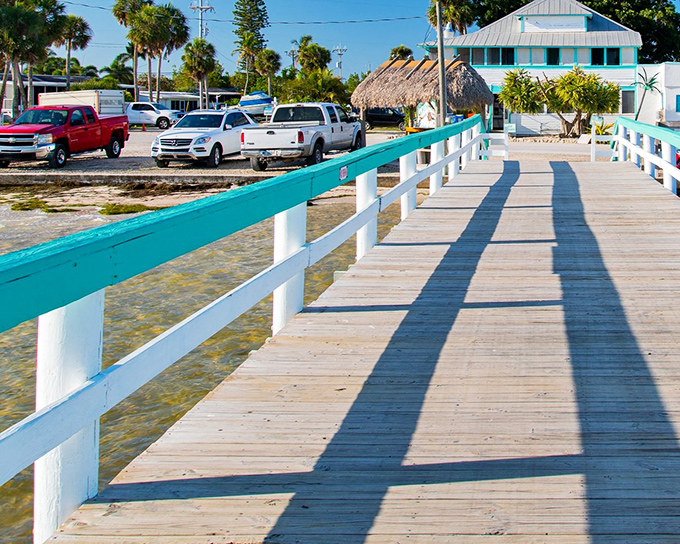 This turquoise-trimmed pier invites you to stroll into the heart of island life, where time slows and worries dissolve with each step.