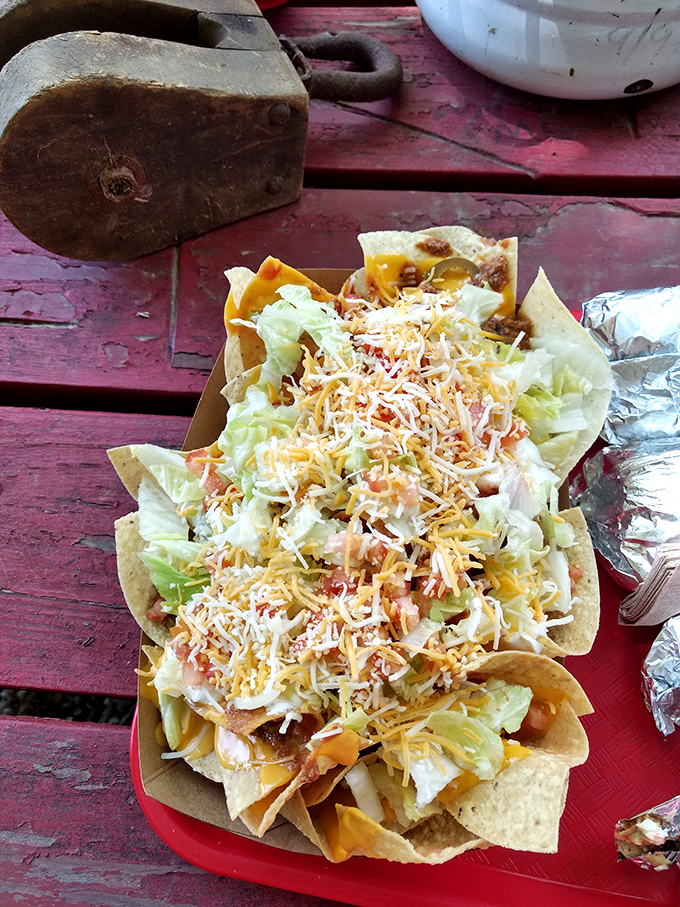 These nachos aren't just a side&mdash;they're a main event. Cheese, lettuce, and chips creating a symphony of crunch and gooey goodness.