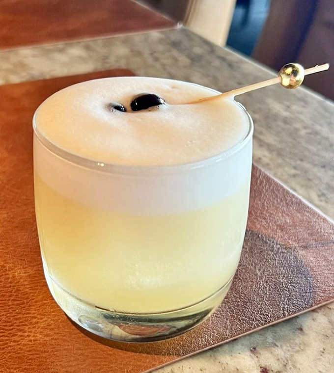 A cocktail that doesn't just look pretty&mdash;it tells a story. That foam cap isn't showing off; it's delivering layers of flavor with each sip.