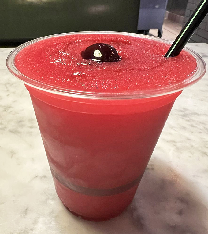 The vibrant Brassarita&mdash;a ruby-red refresher that's like summer in a cup. This isn't your poolside slushie; it's what grown-up beverages aspire to be.