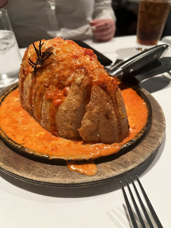This isn't just bread—it's a volcanic cheese eruption that makes you question why anyone would ever skip the carbs. Worth every delicious calorie.
