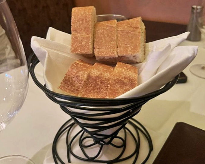 The bread basket&mdash;that humble opening act that separates good steakhouses from great ones. Simple, crusty, and ready for butter duty.