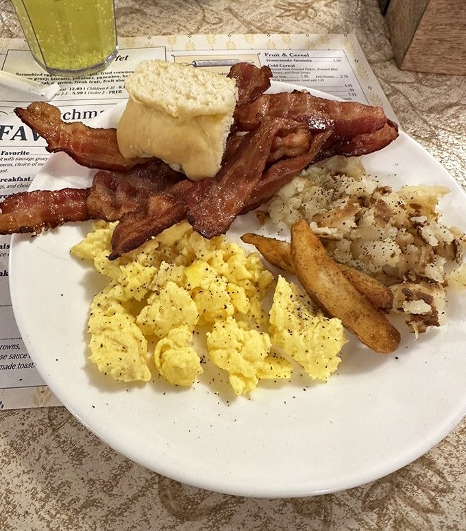 Breakfast of champions: scrambled eggs that actually taste like eggs, bacon that stands at attention, and home fries worthy of their name.